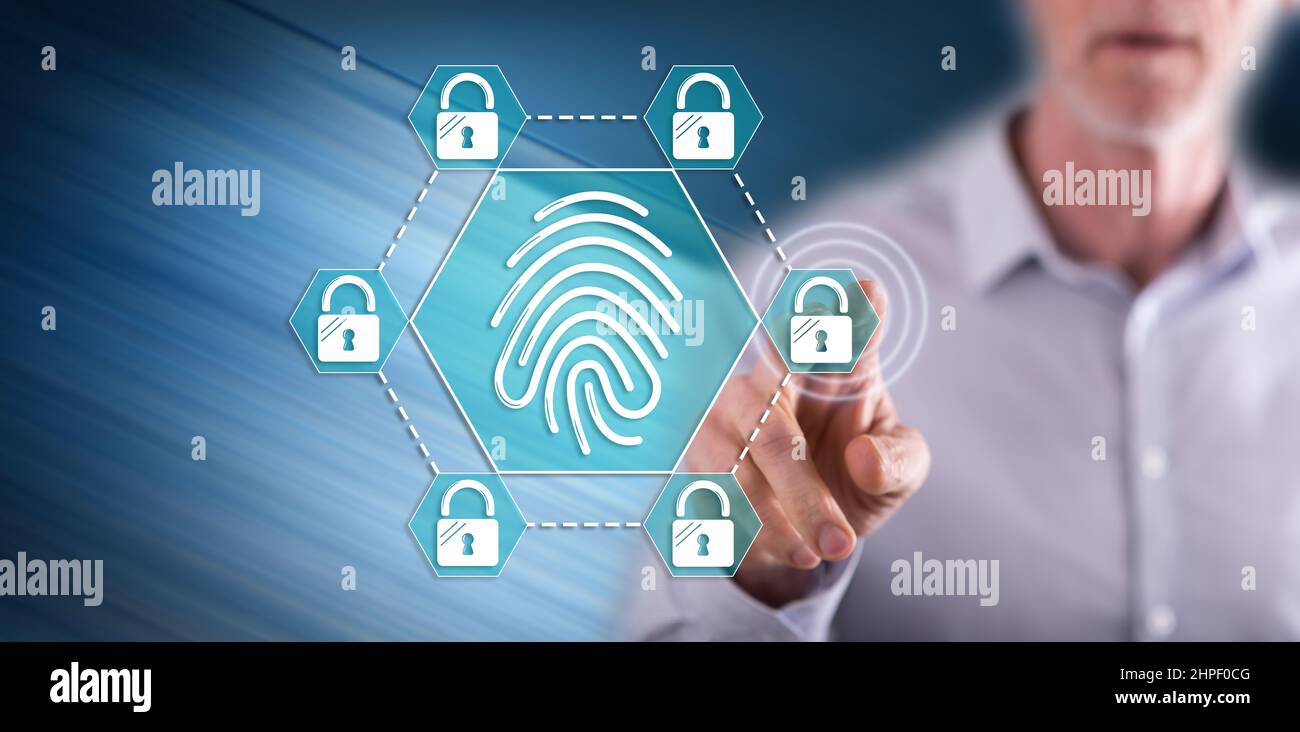 Man touching a fingerprint security system concept on a touch screen ...
