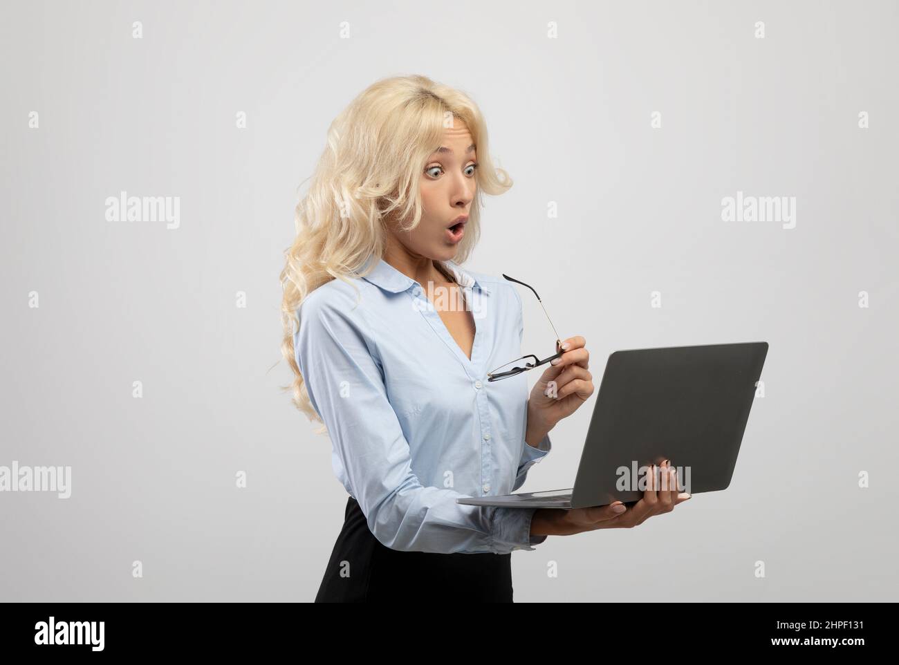 Surprised shocked secretary blonde hi-res stock photography and images ...