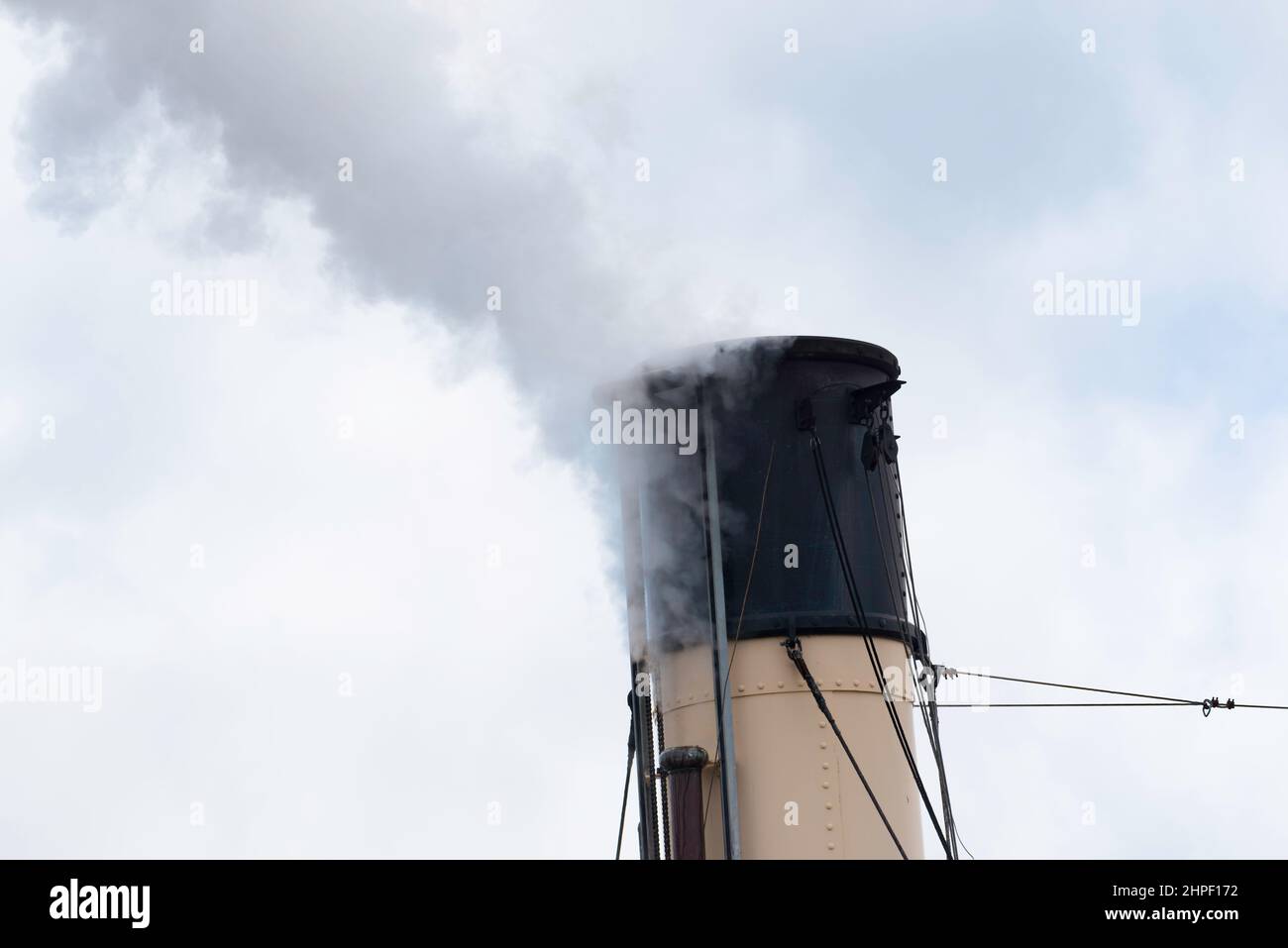 Steam pours from the funnel of the historic 1902 steam tug Waratah ...