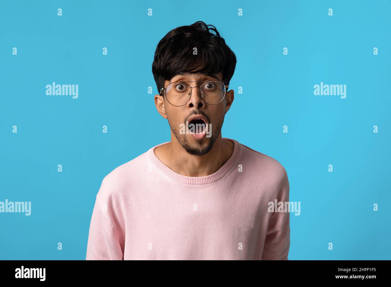 Amazed guy with eyes and mouth open looking at camera Stock Photo - Alamy