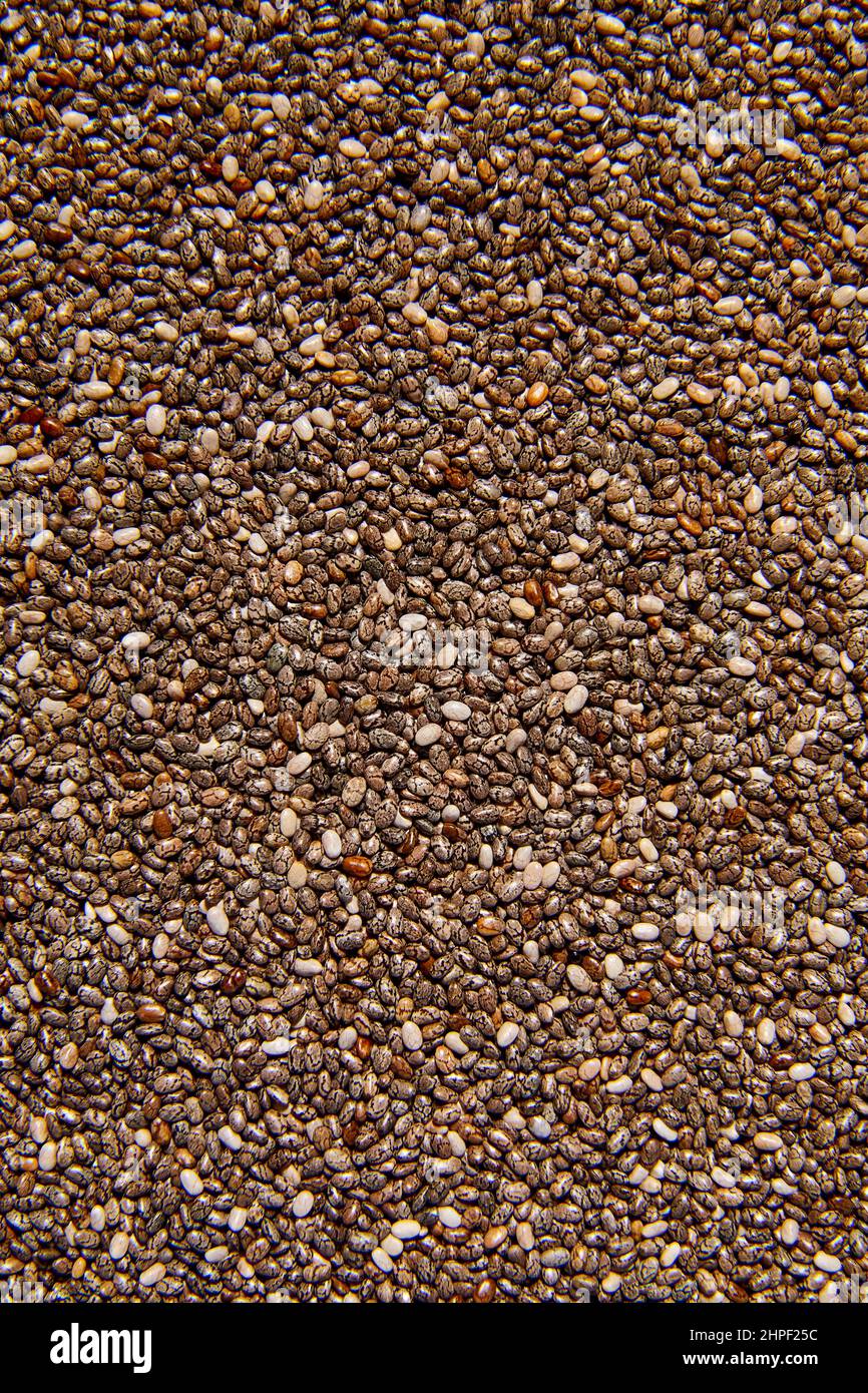 Flat lay macro natural dried Chia seeds, top view, close up texture ...