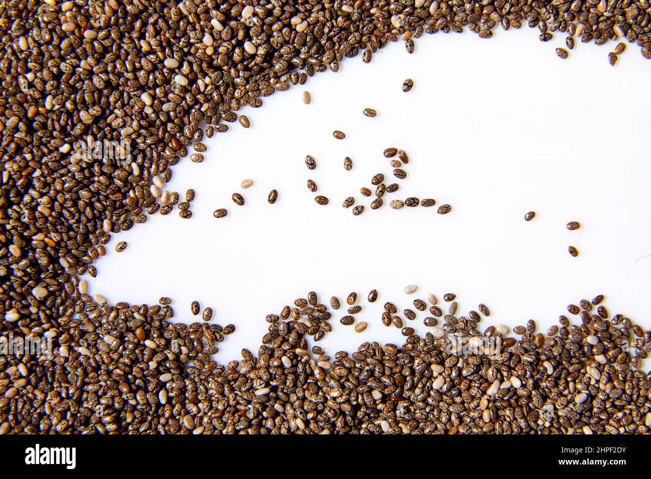 Flat lay macro natural dried Chia seeds, top view, close up texture ...