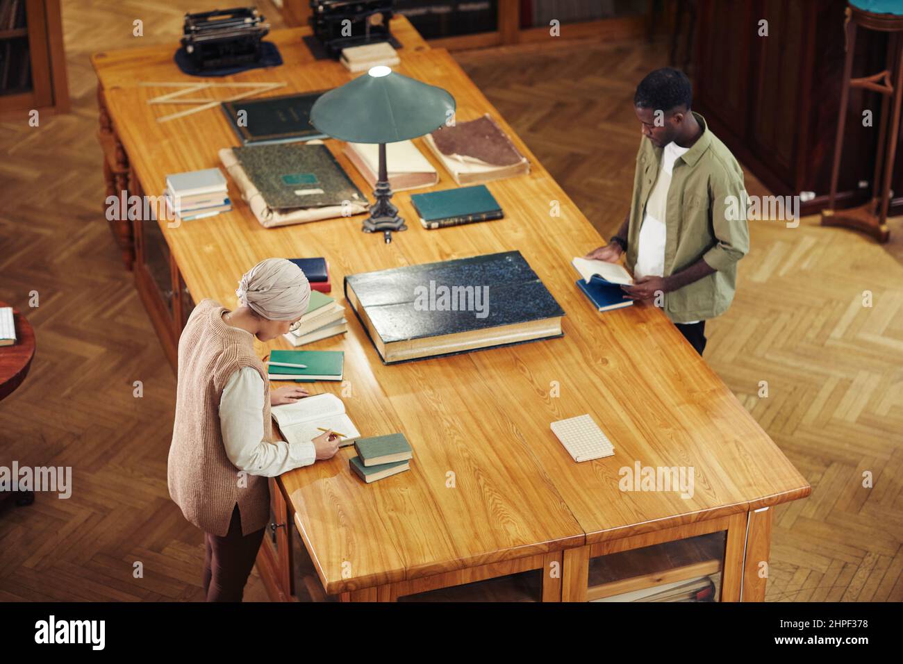 High angle background of classic library interior with group of people ...
