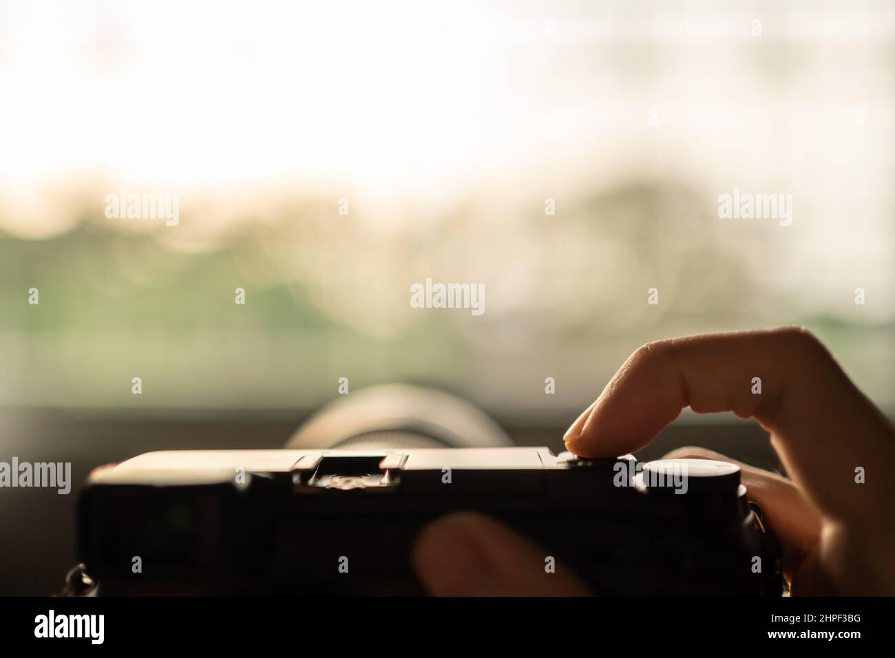Taking a nature photography by pressing a shutter button Stock Photo ...