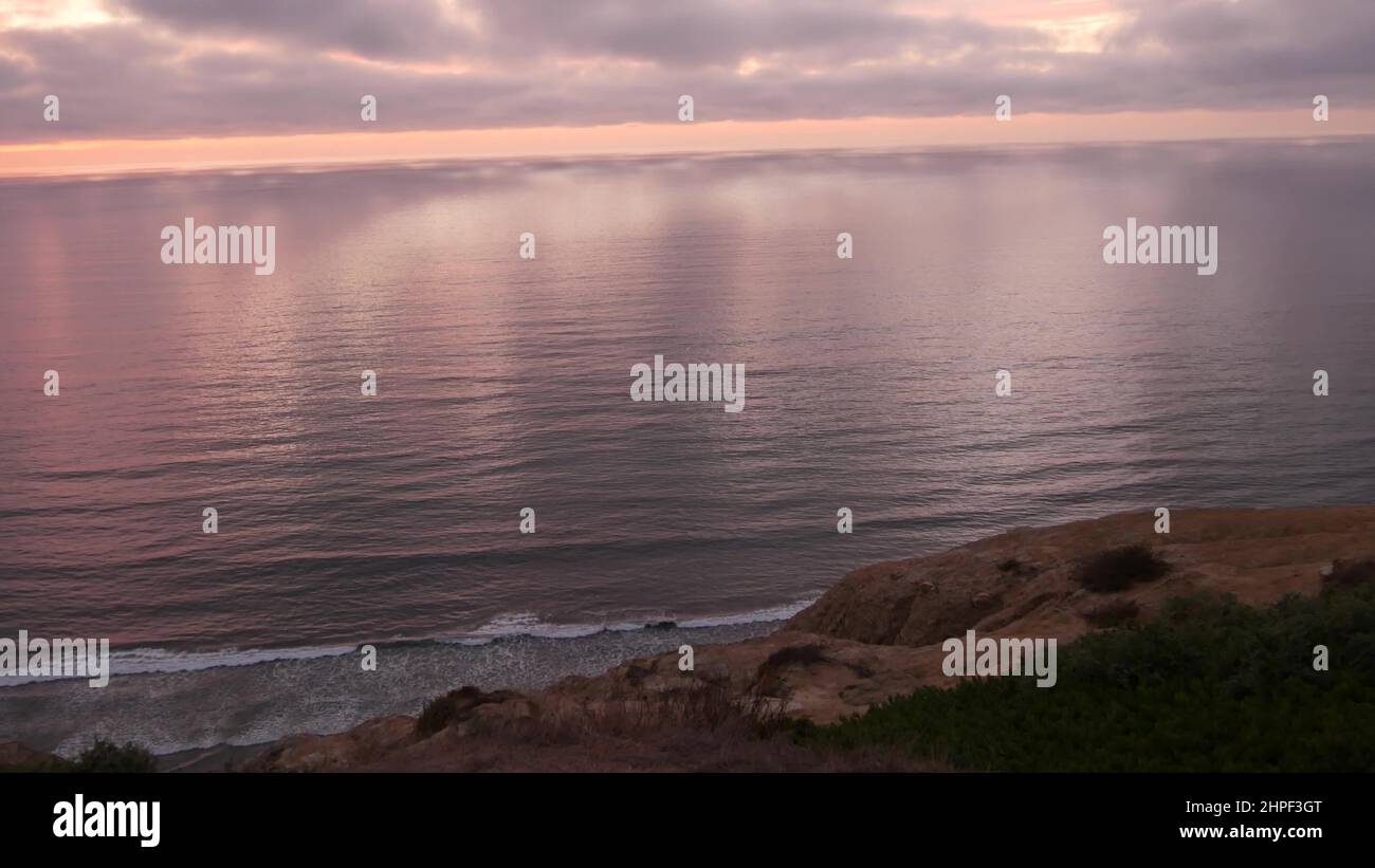 Dramatic cloudscape at sunset, reflection of pink sky, clouds. Torrey ...