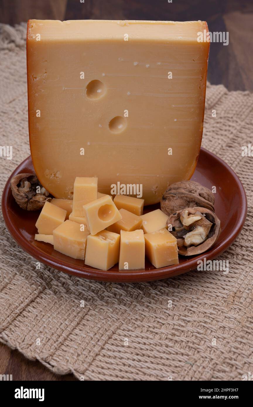 Dutch hard cow milk old yellow cheese from Gouda Stock Photo - Alamy