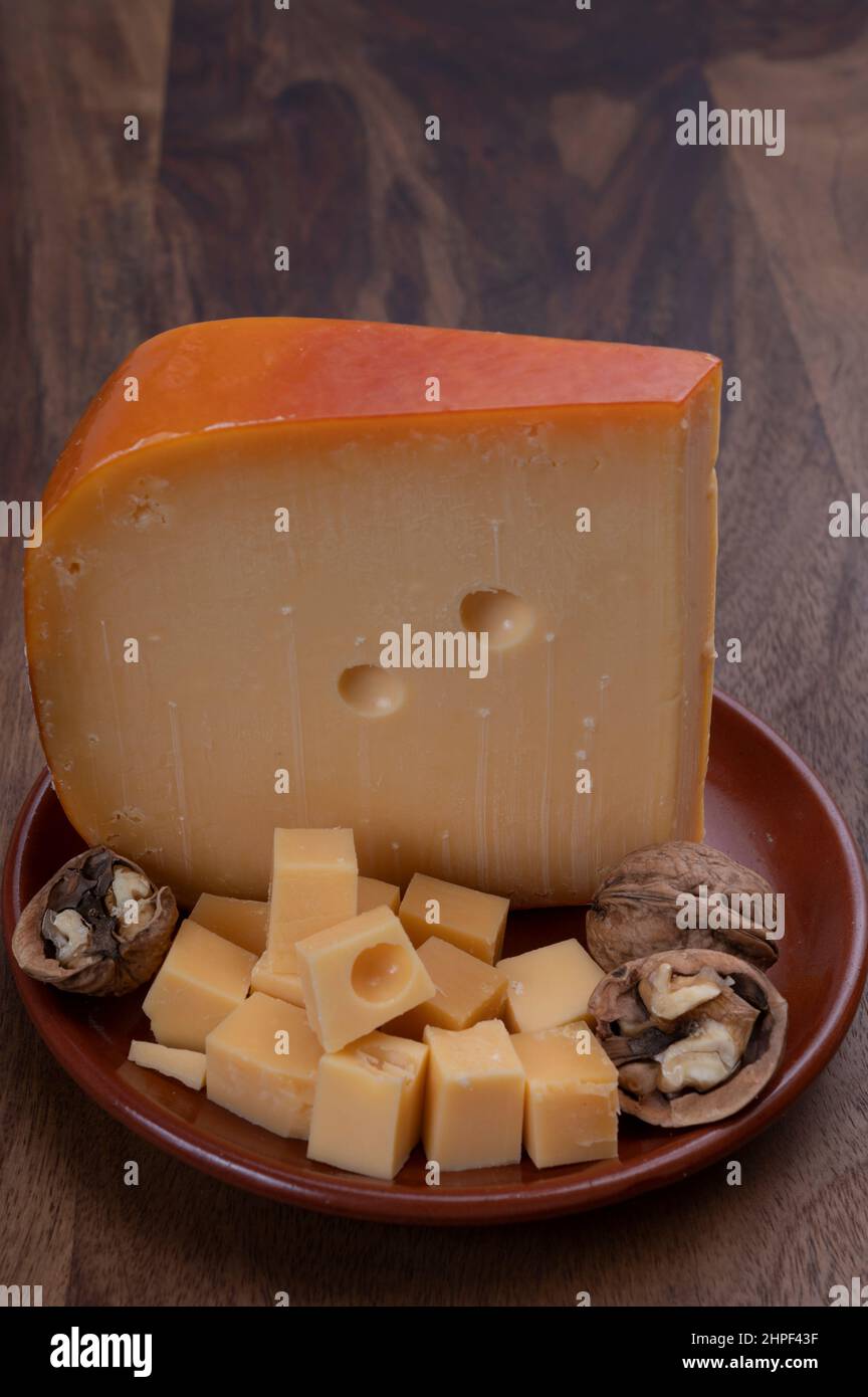 Dutch hard cow milk old yellow cheese from Gouda Stock Photo - Alamy