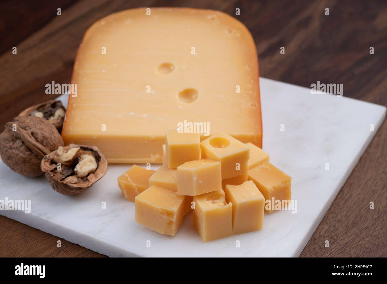 Dutch hard cow milk old yellow cheese from Gouda Stock Photo - Alamy