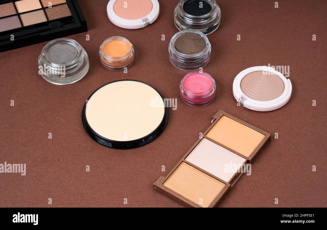Group of cosmetic and makeup products on studio background Stock Photo ...