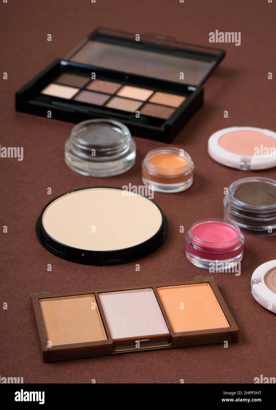 Group of cosmetic and makeup products on studio background Stock Photo ...