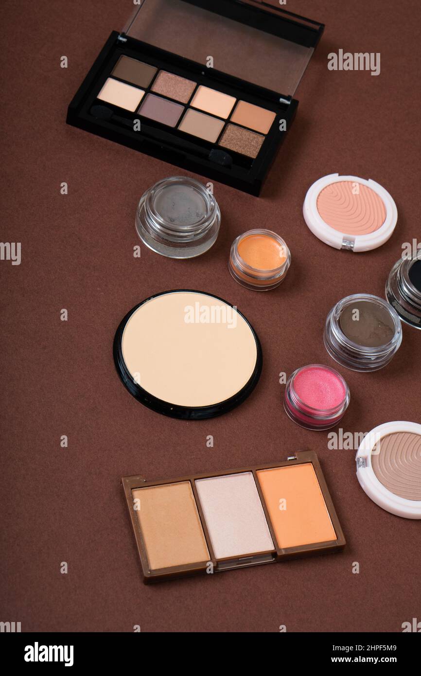 Group of cosmetic and makeup products on studio background Stock Photo ...