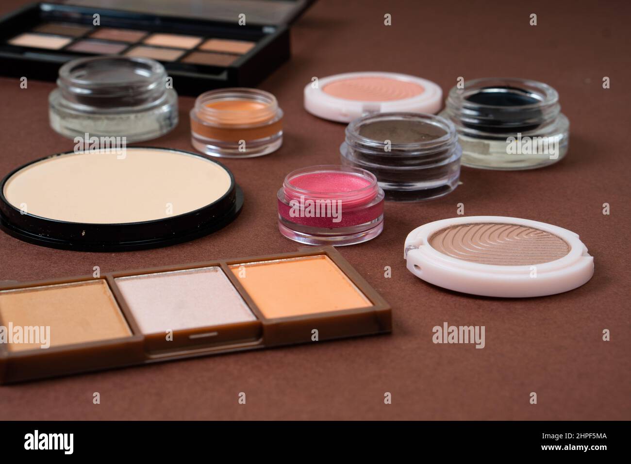 Group of cosmetic and makeup products on studio background Stock Photo ...