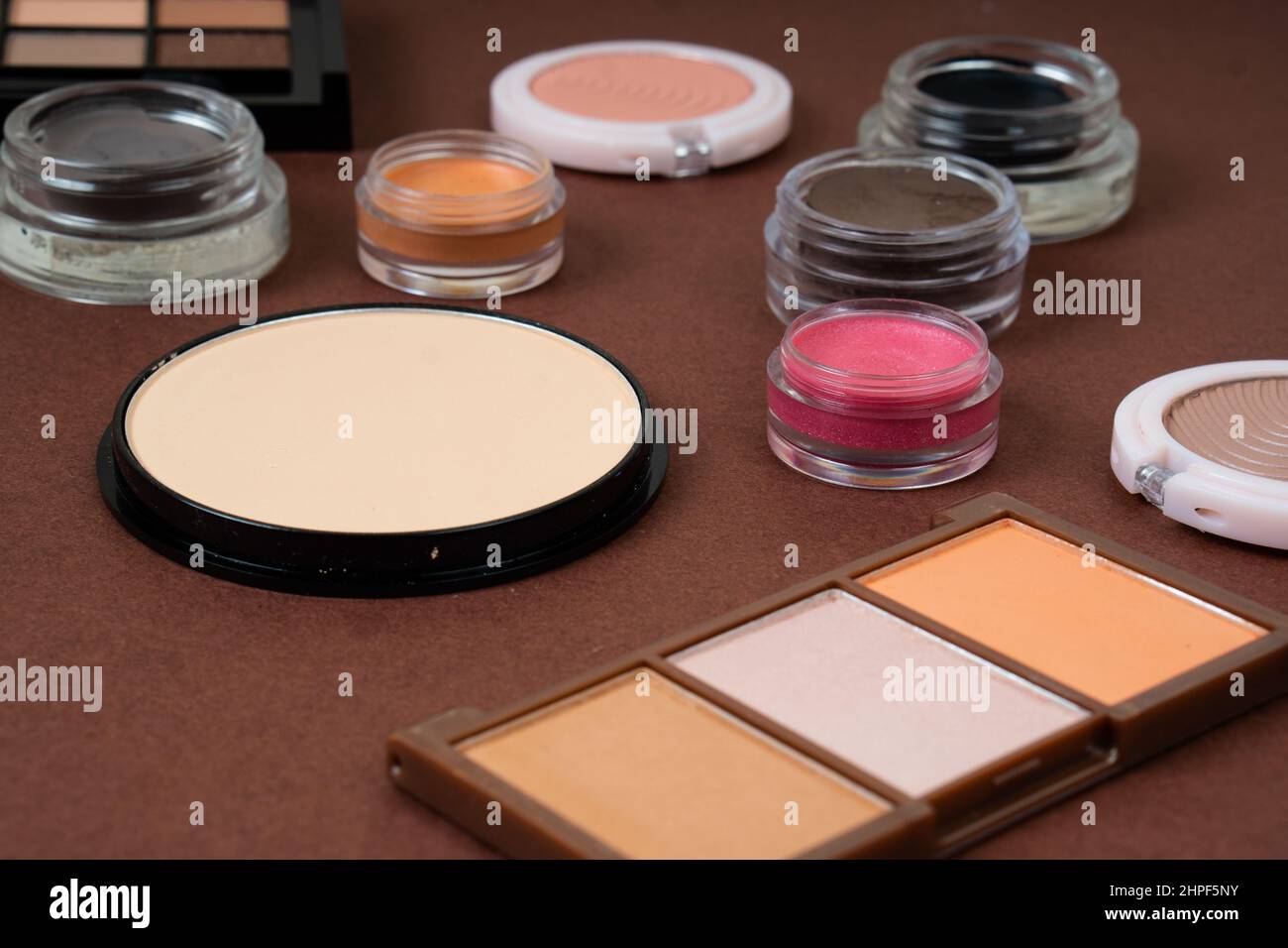 Group of cosmetic and makeup products on studio background Stock Photo ...