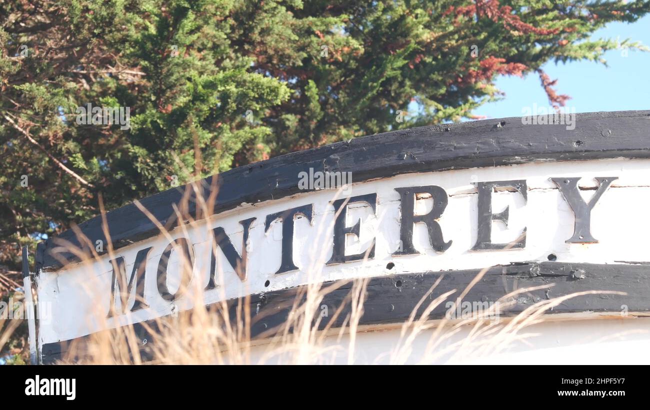 Monterey sign on white wooden boat stern, fisherman nautical vessel ...