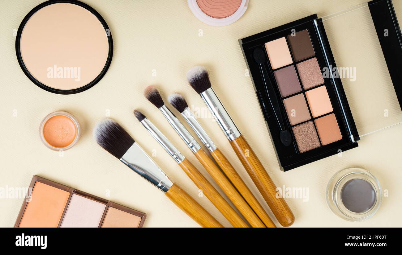 Group of cosmetic and makeup products on studio background Stock Photo ...