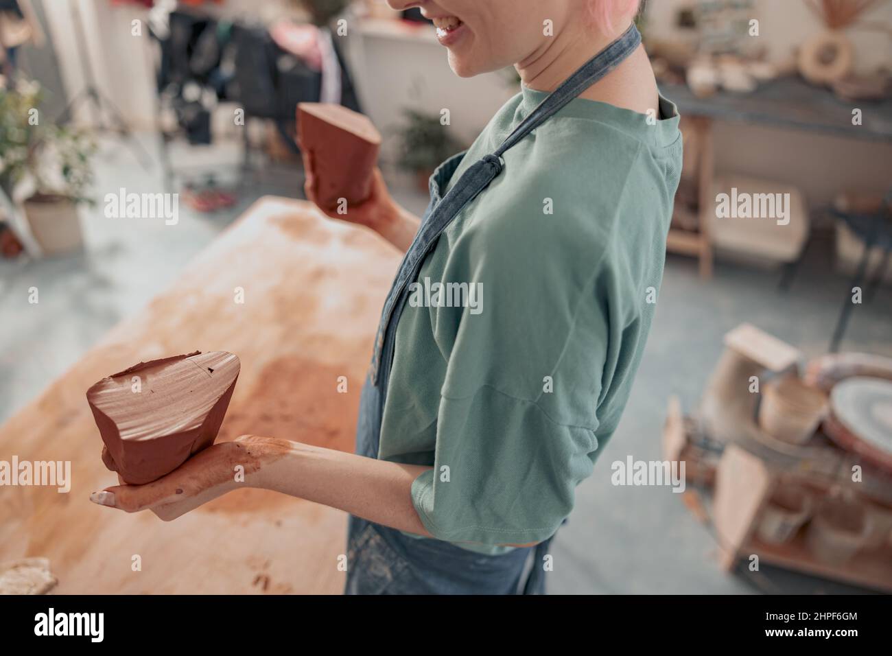 Female master ceramist working at her studio Stock Photo - Alamy