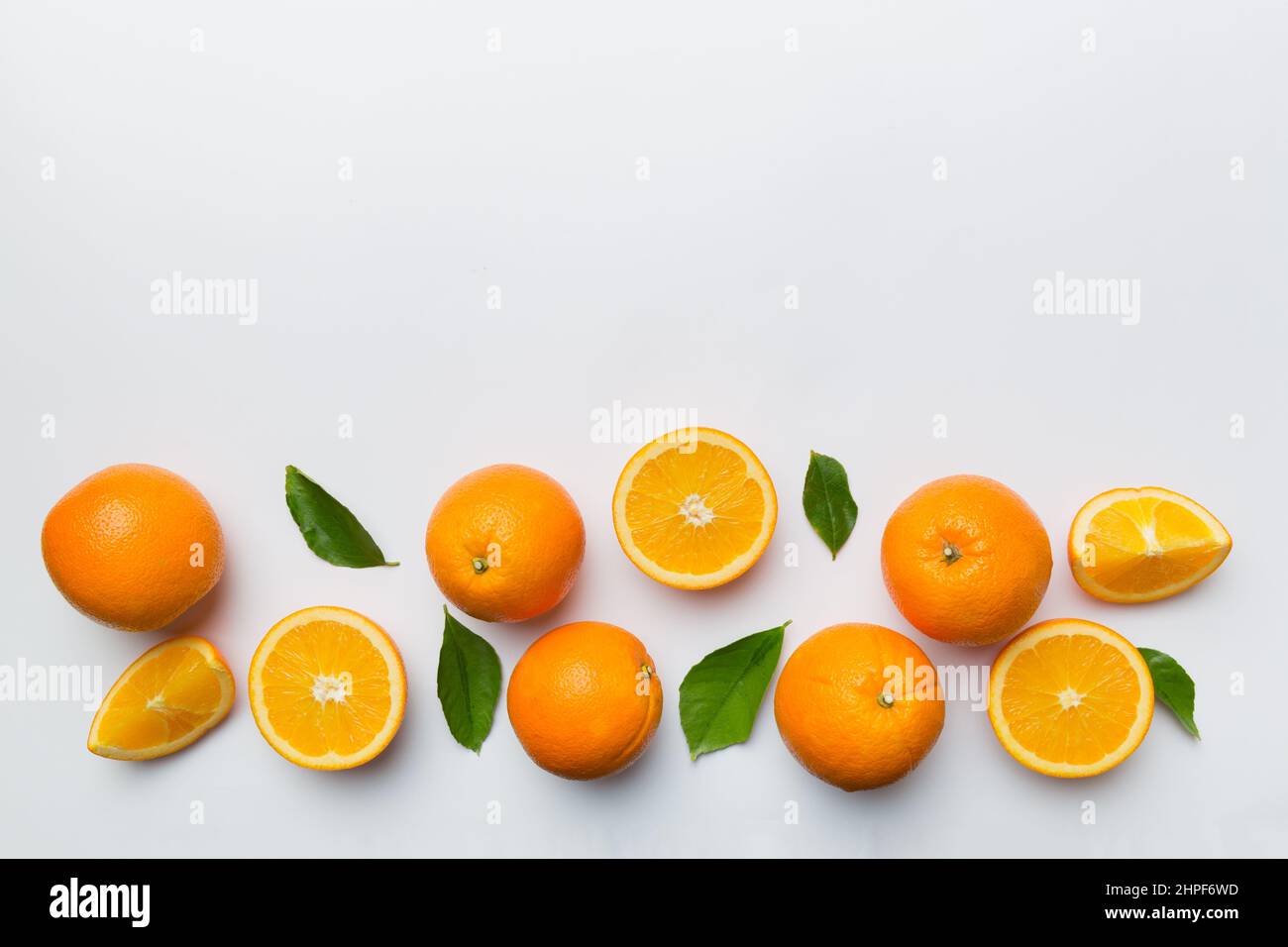 fresh Fruit orange slices on colored background. Top view. Copy Space ...