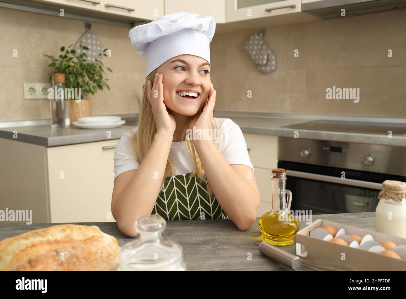 Beautiful female chef cooking home hi-res stock photography and images ...