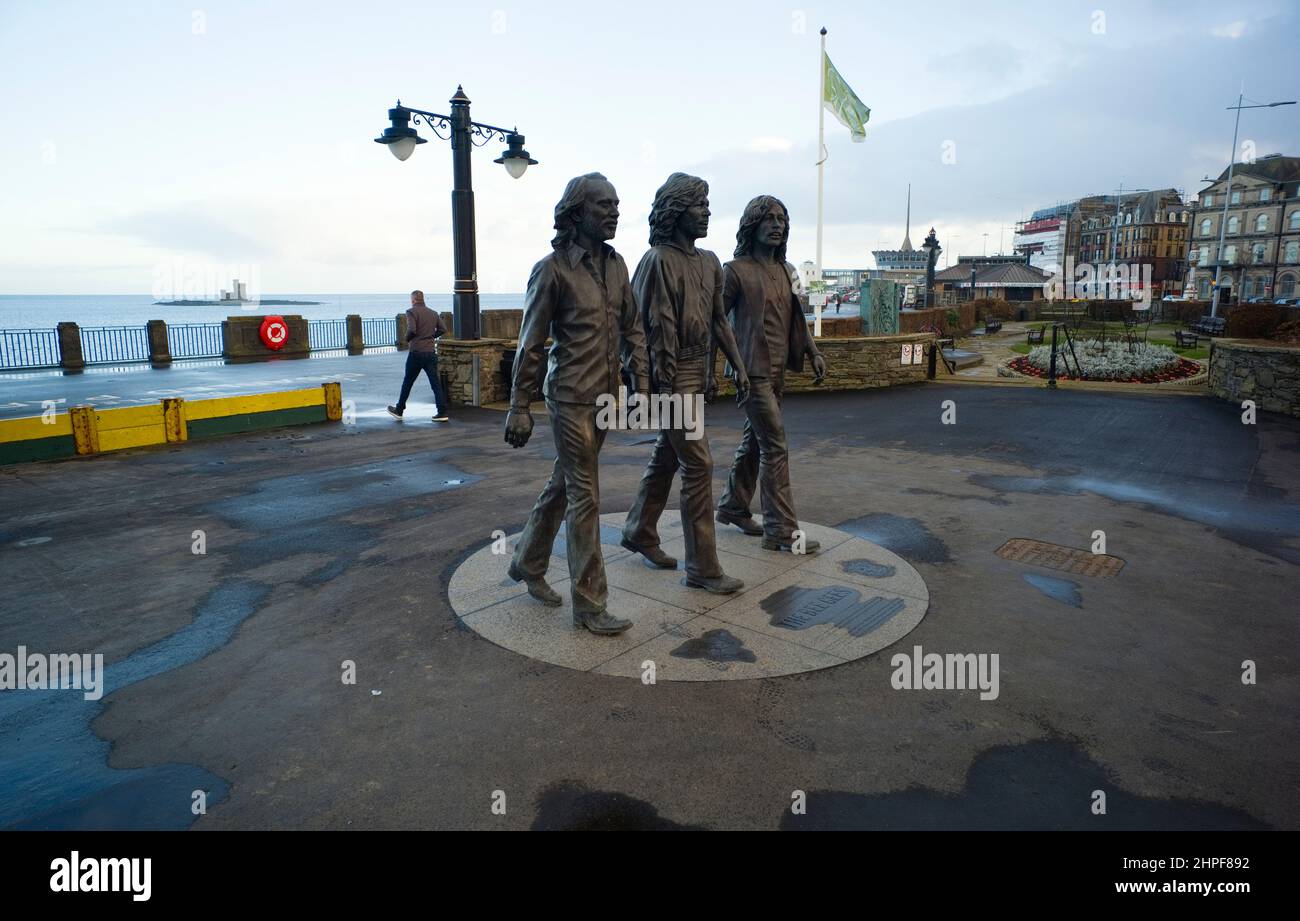 Statue of the Bee Gees on Douglas promenade, Isle of Man where some of ...