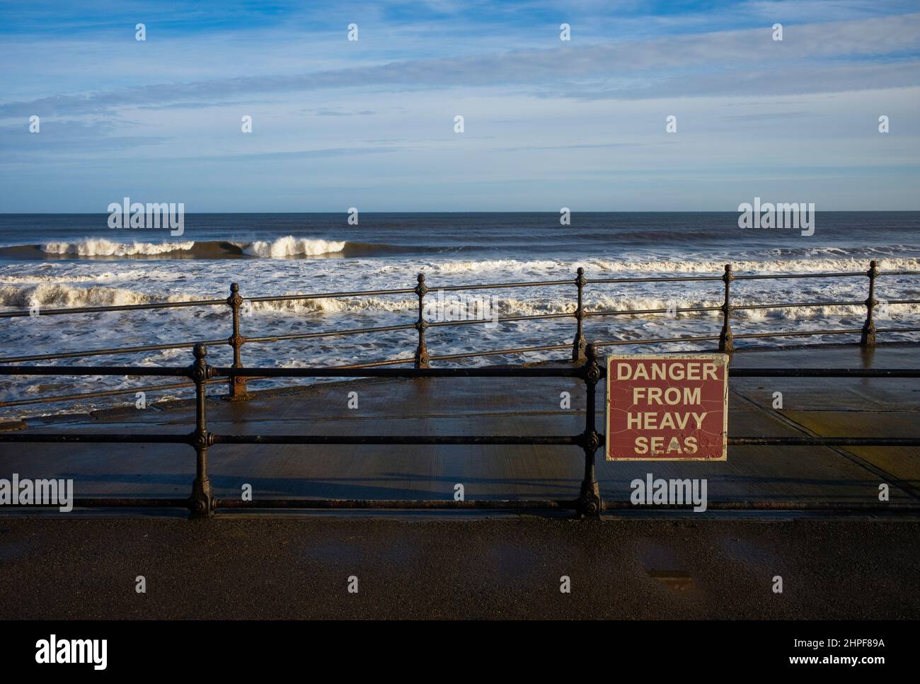 Danger from heavy seas sign at North beach in Scarborough Stock Photo ...