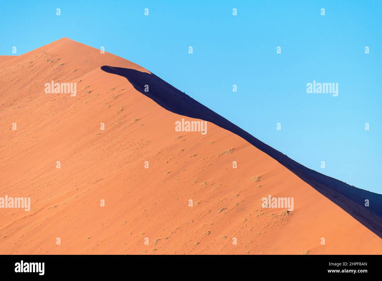Big natural duna in the sunny desert on the blue sky background, hot ...