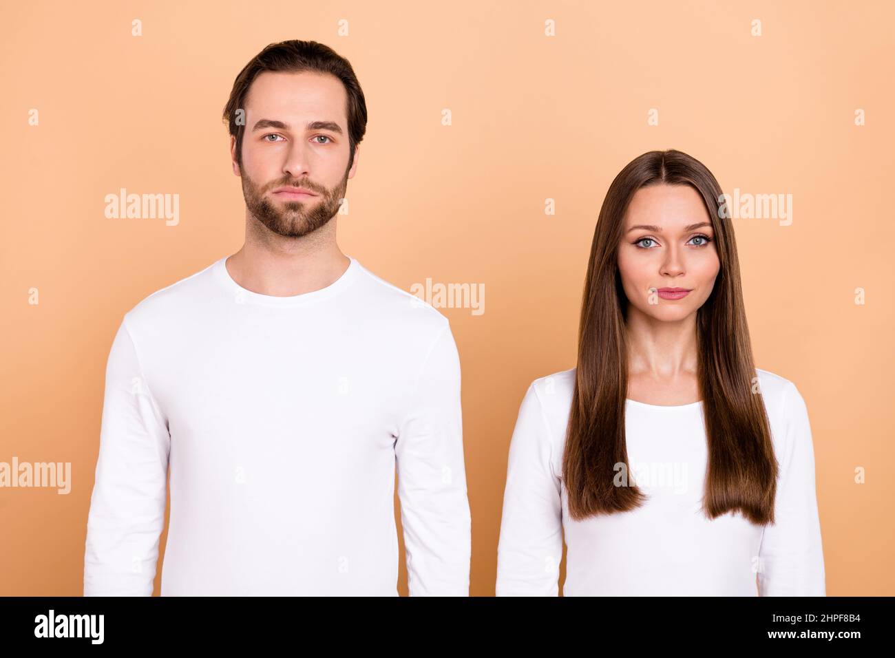 Portrait of attractive content skilled team life partners wearing white ...