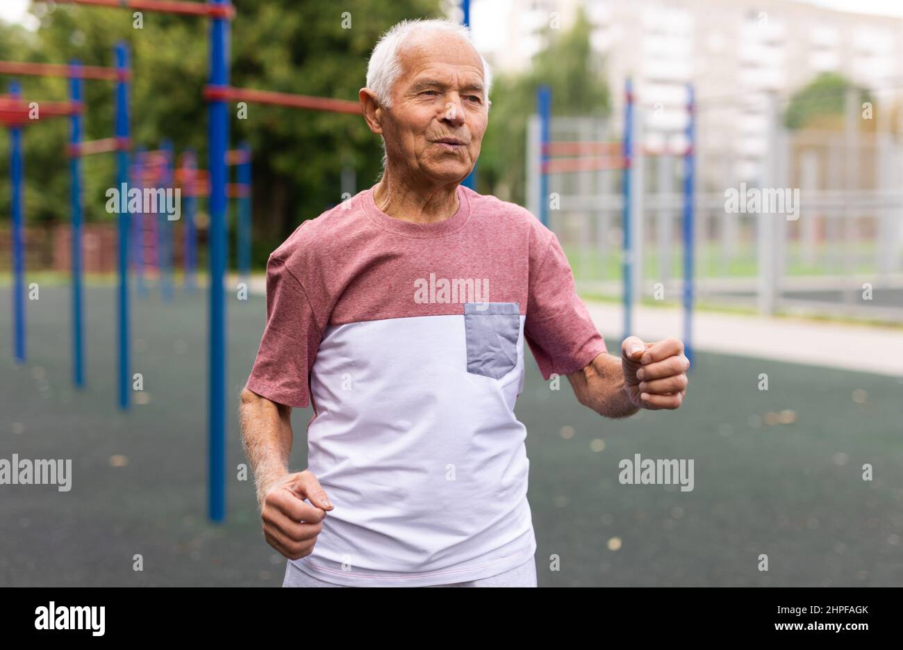 Old man running hi-res stock photography and images - Alamy