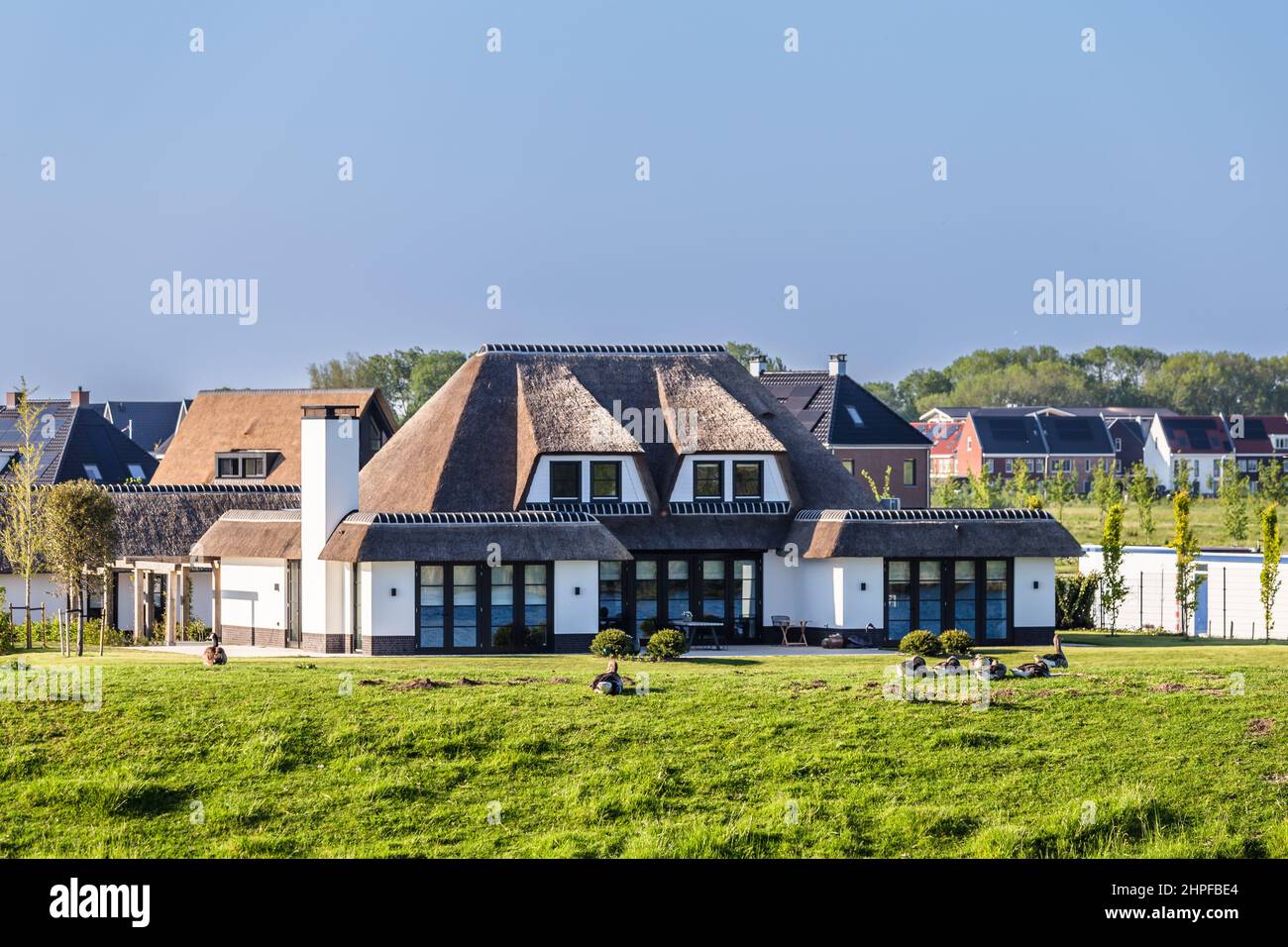 Numansdorp, The Netherlands - May 30, 2021: Modern white villa with ...