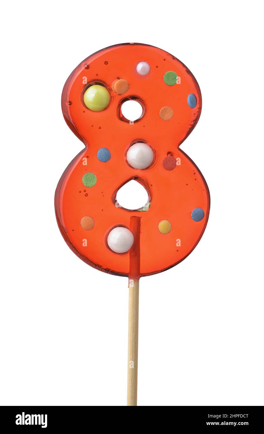Front view of red transparent handmade number eight lollipop isolated ...