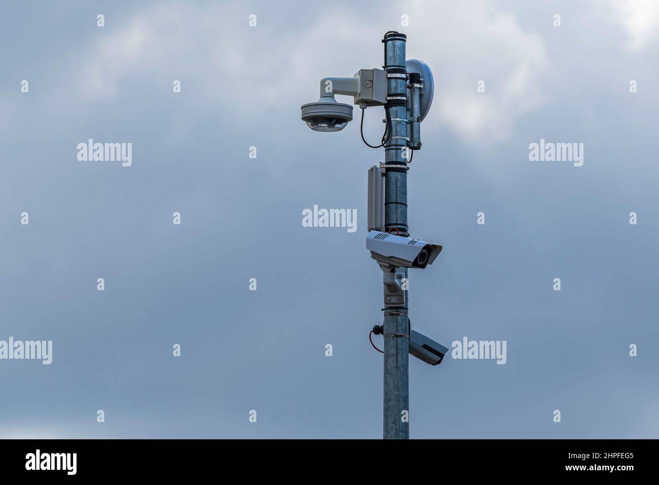 Surveillance cameras on a mast Stock Photo - Alamy