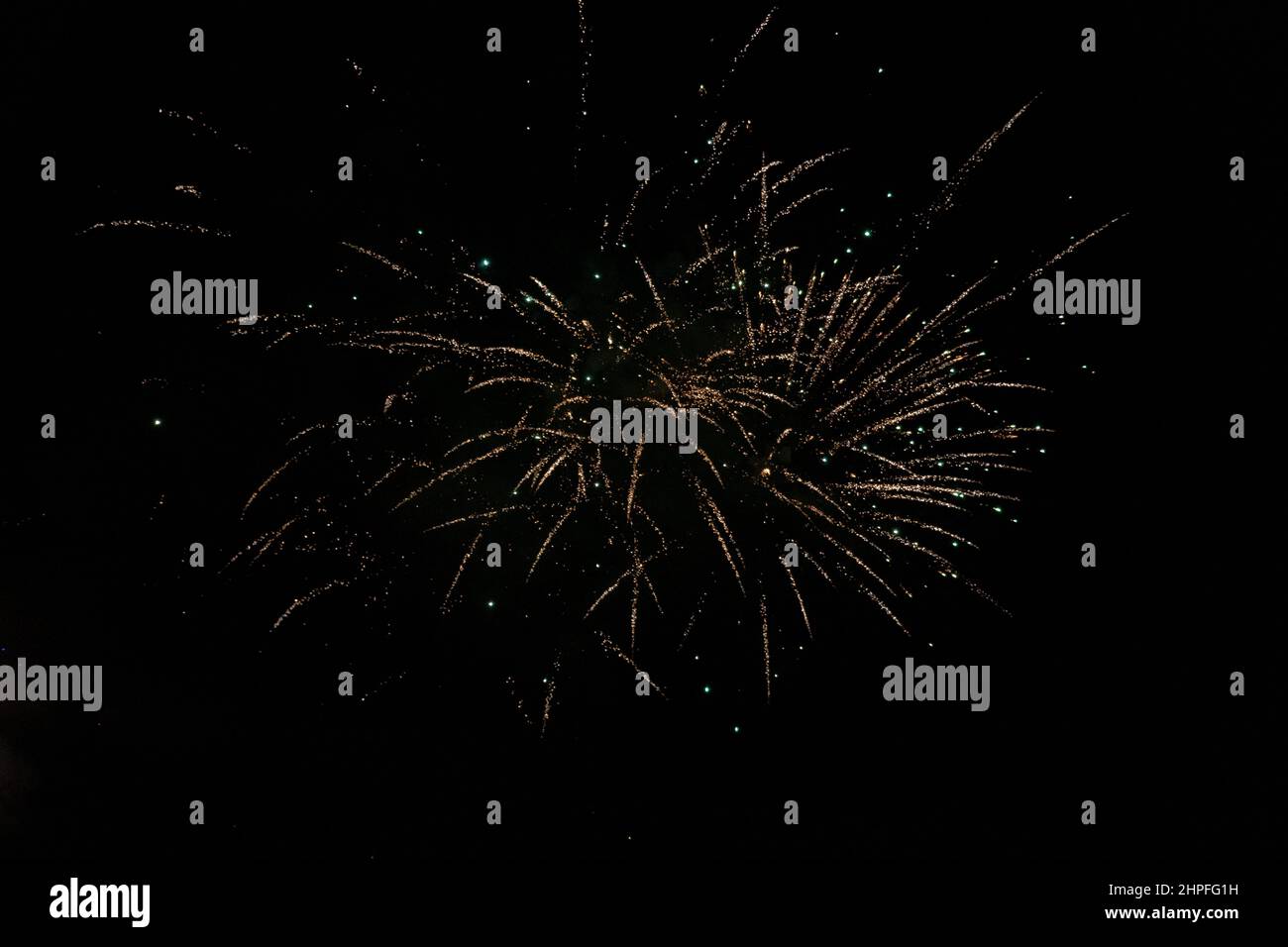 single explosion of one firework in the distance Stock Photo - Alamy