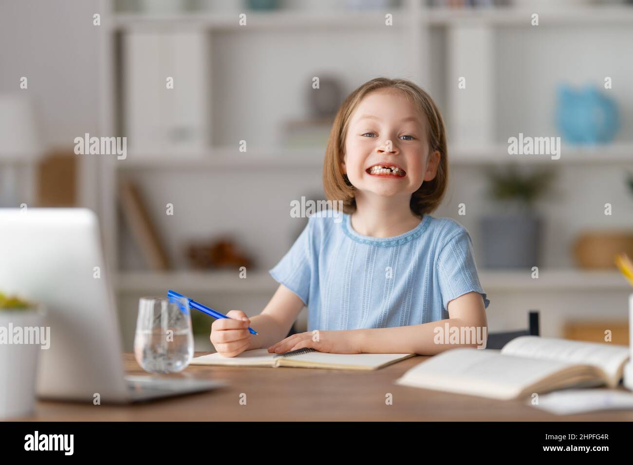 Happy Child Doing Homework