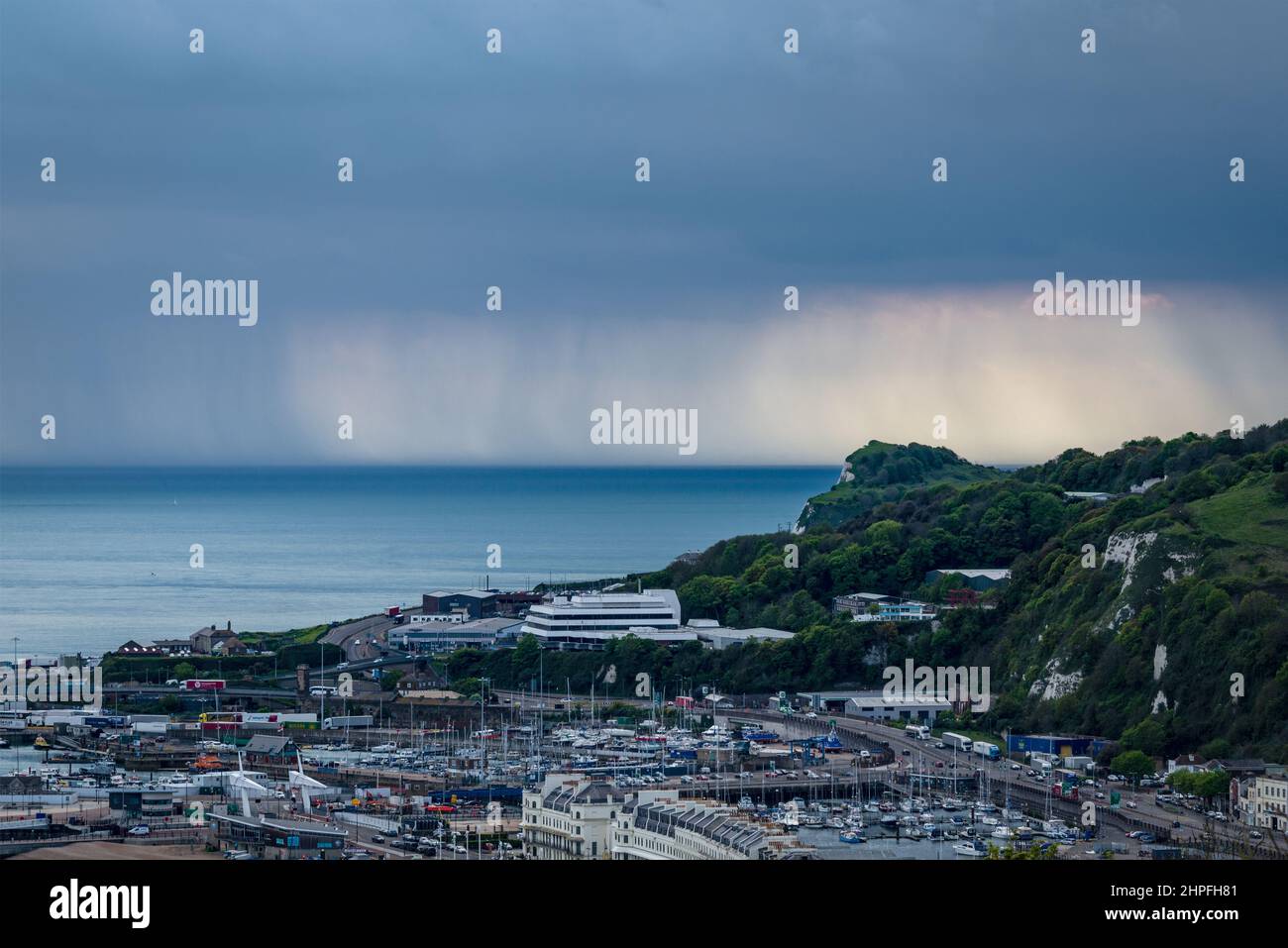 A view of heavy rain across the English Channel with the Port of Dover ...