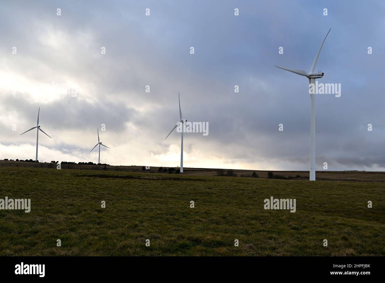 Wind turbines on a grey sky in the south of france Stock Photo - Alamy
