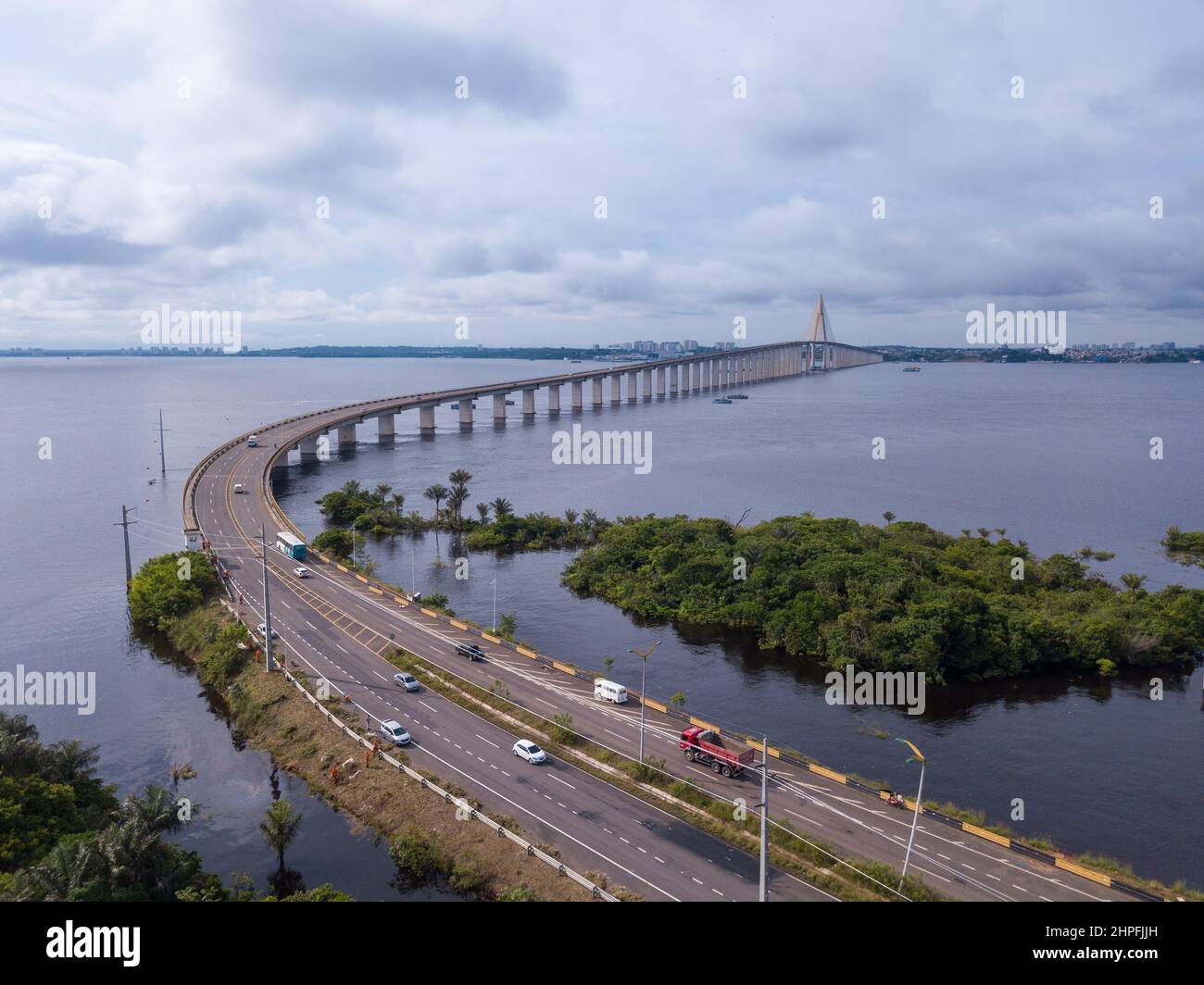 Beautiful drone aerial view of Negro river, trees and bridge ...
