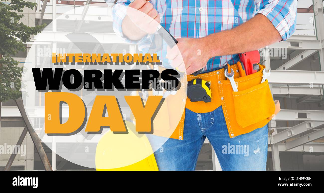 International workers day text symbol over midsection of caucasian ...