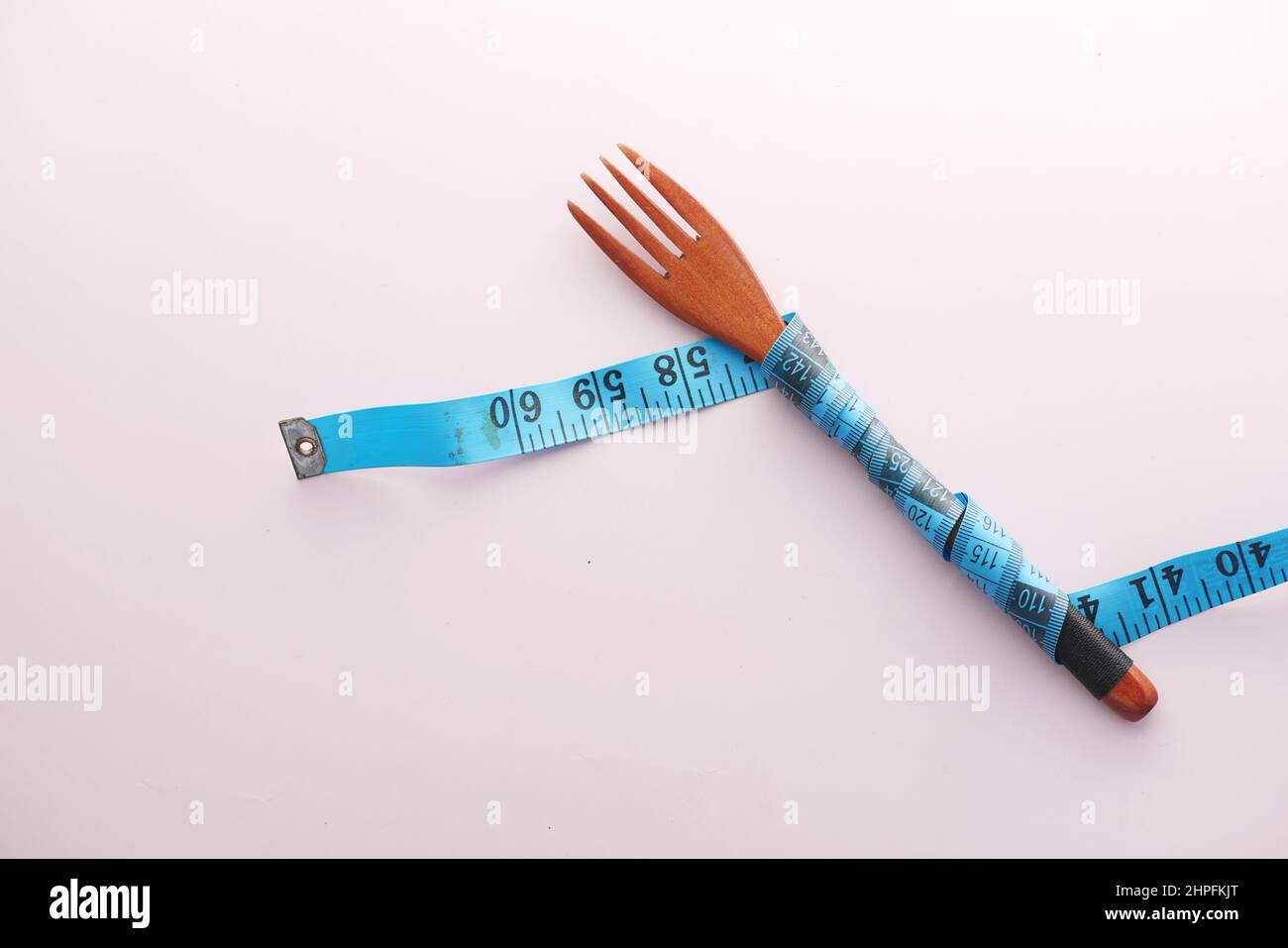 Fork and tape measure hi-res stock photography and images - Alamy