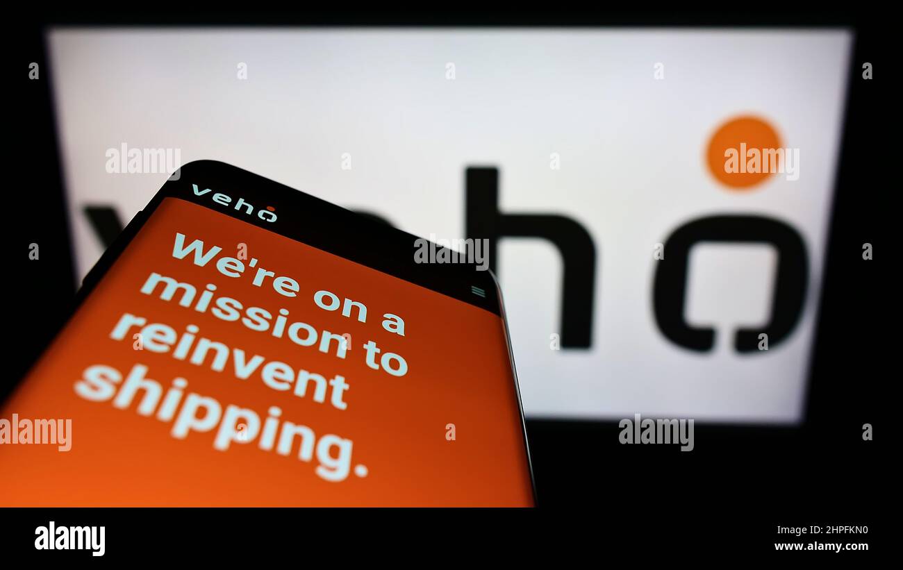 Mobile phone with webpage of American delivery company Veho Tech Inc ...