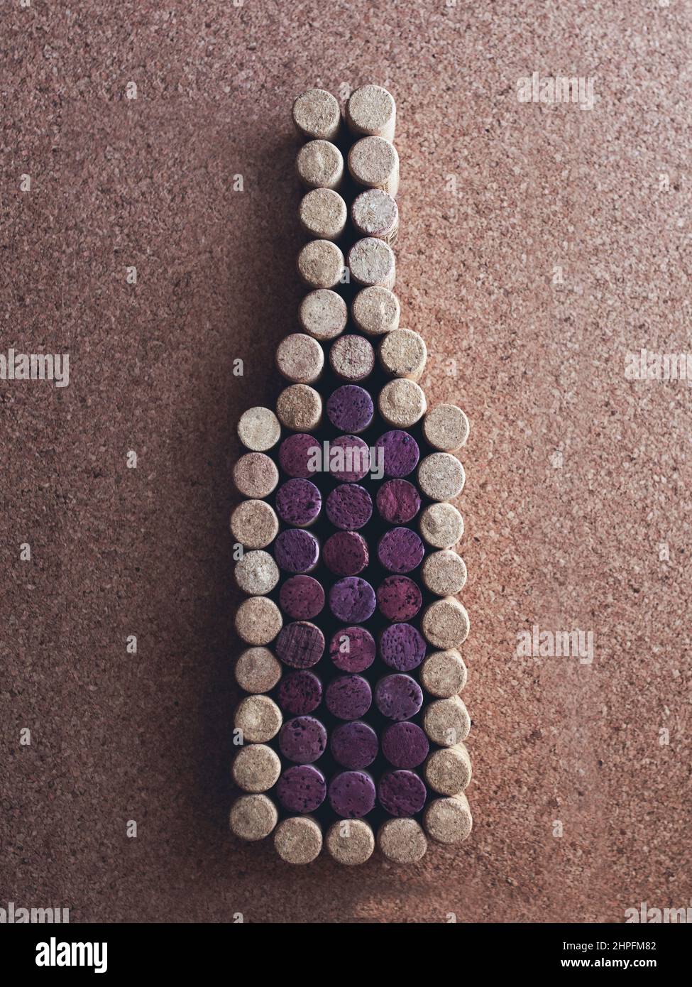 bottle of wine made of corks on the background of a cork surface Stock ...