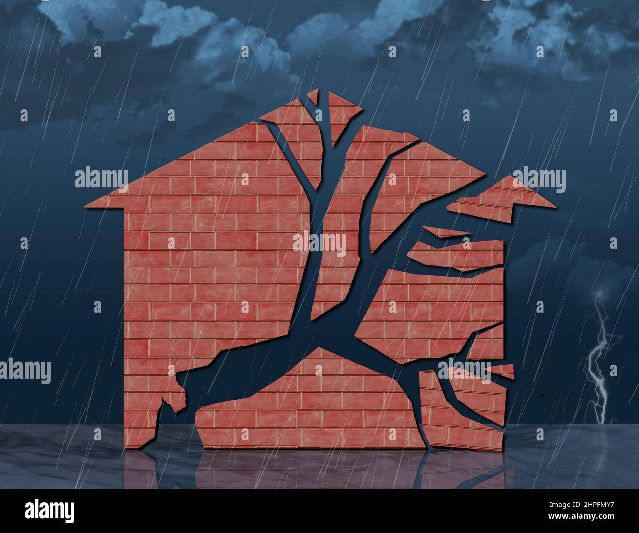 A brick home is shattered into the shape of a storm damaged tree as a ...