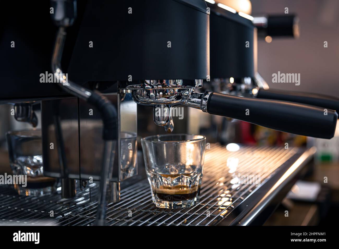The process of preparing espresso in a professional coffee machine ...