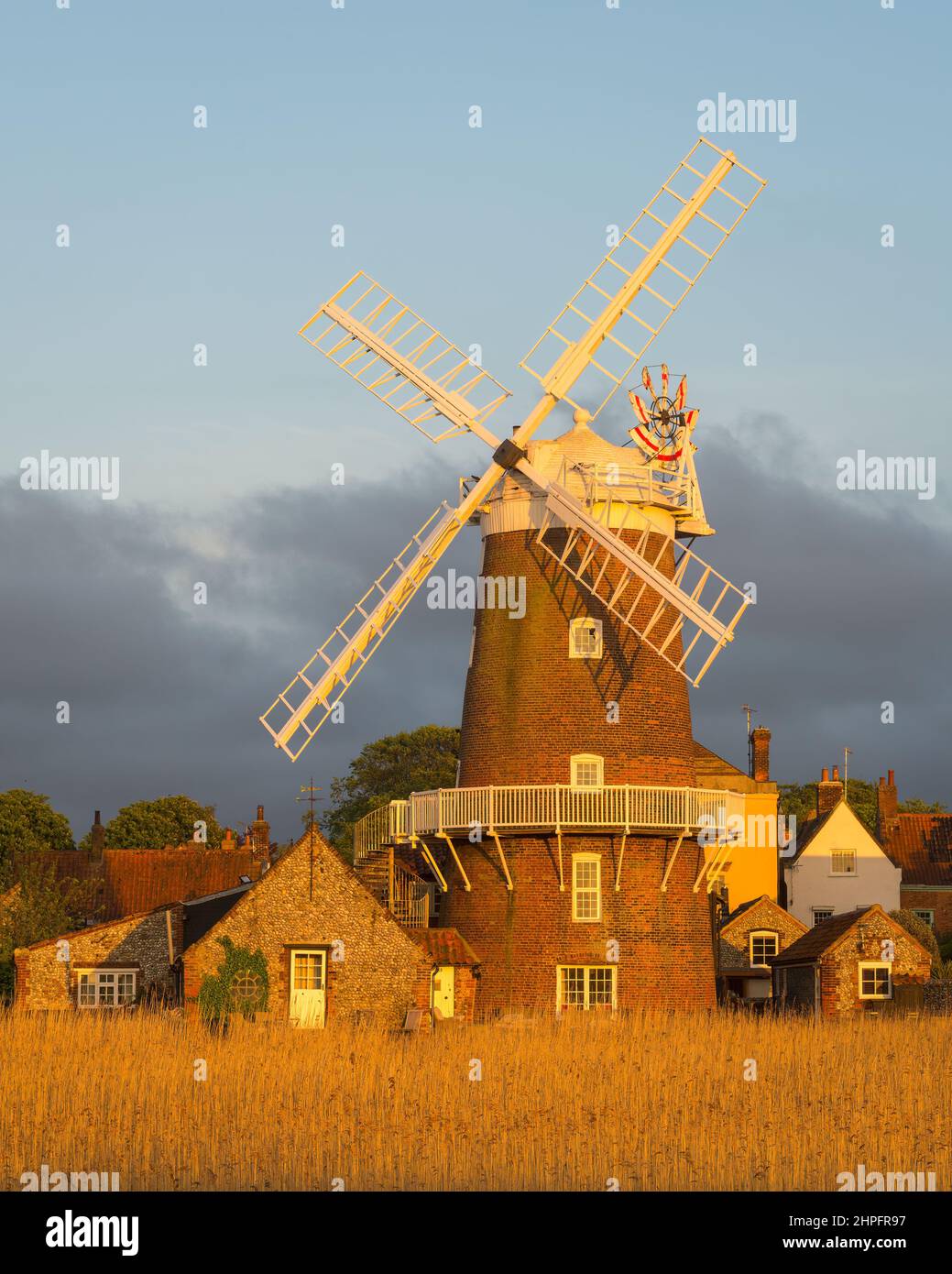 Late afternoon spring sunshine lighting up the windmill at Cley next ...