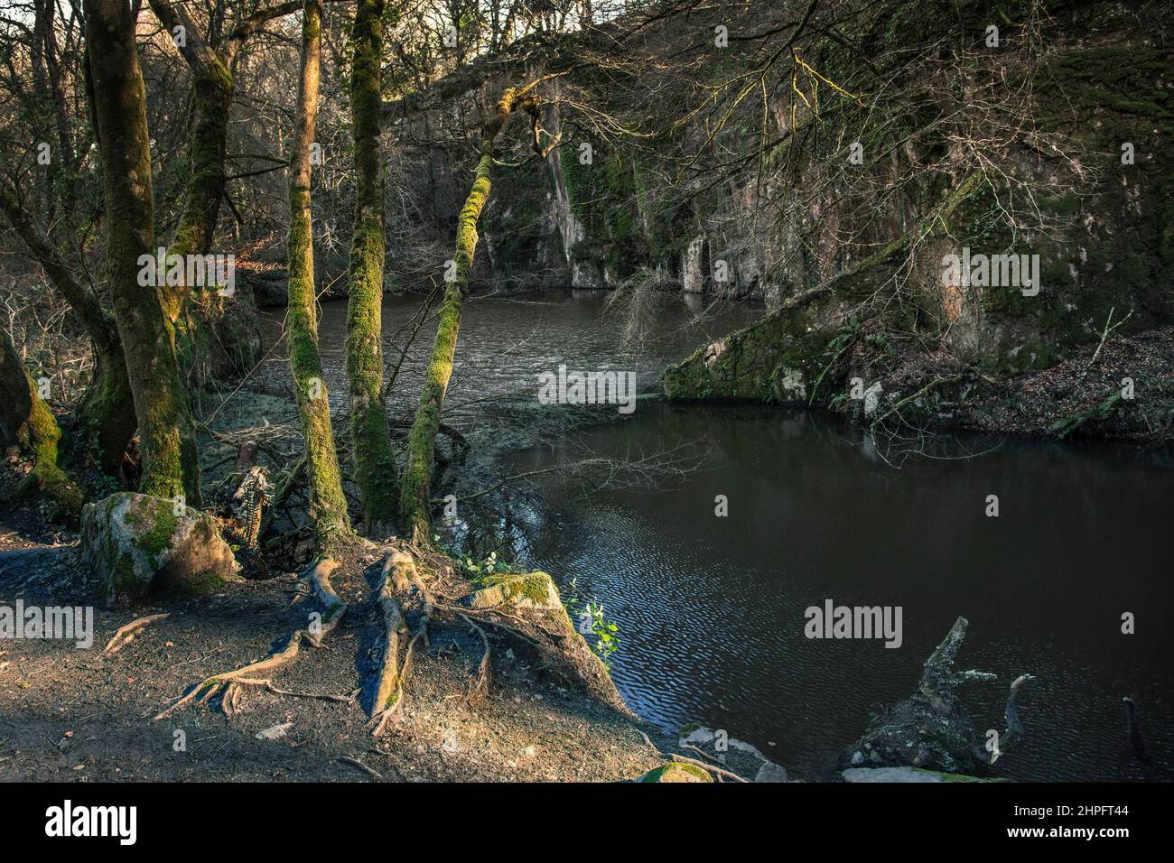 A water filled granite quarry in the historic Kennall Vale nature ...