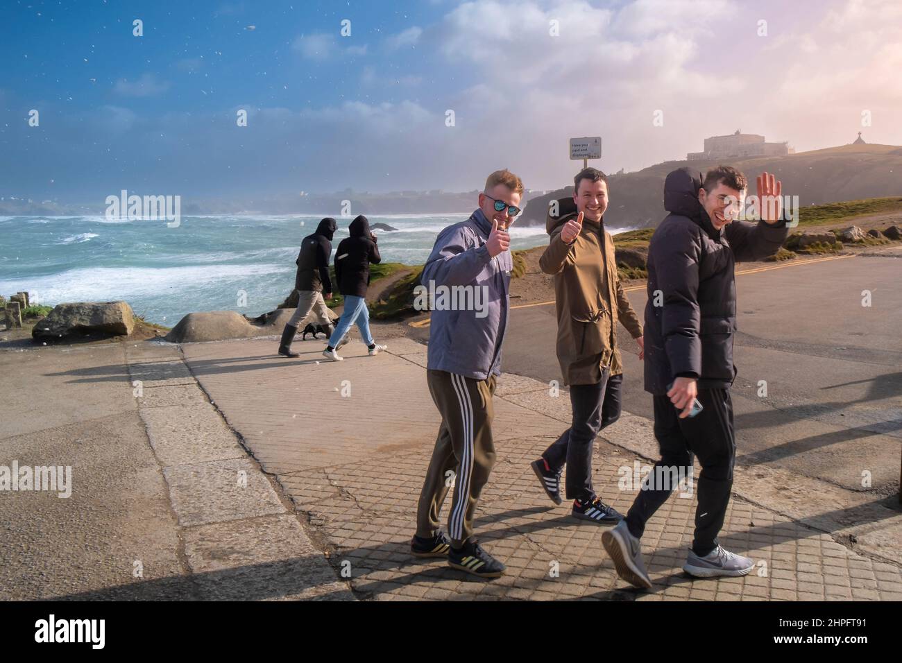 People enjoying a walk in the high wind brought by Storm Eunice in ...