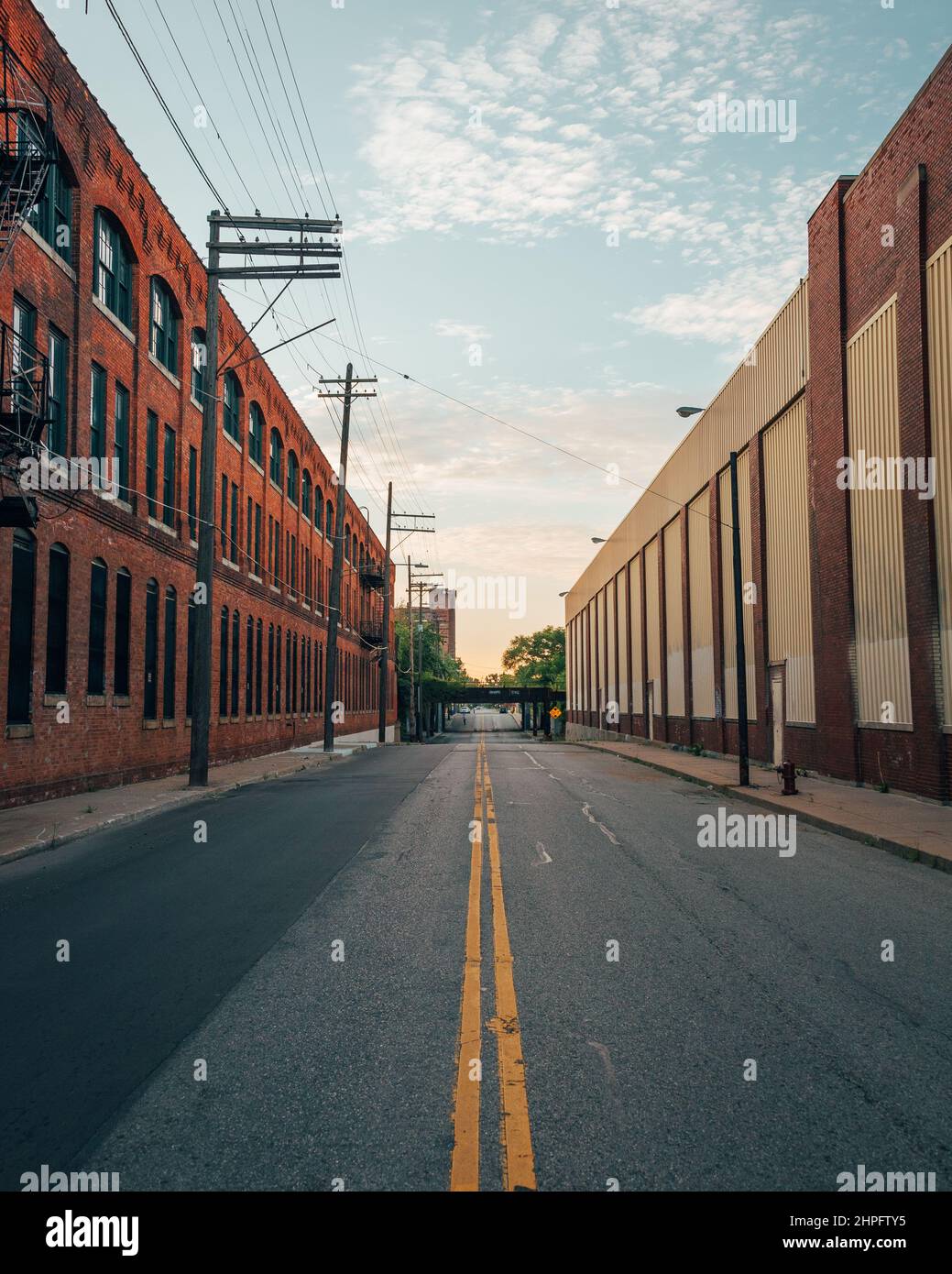 Street lined with old industrial buildings in Detroit, Michigan Stock ...