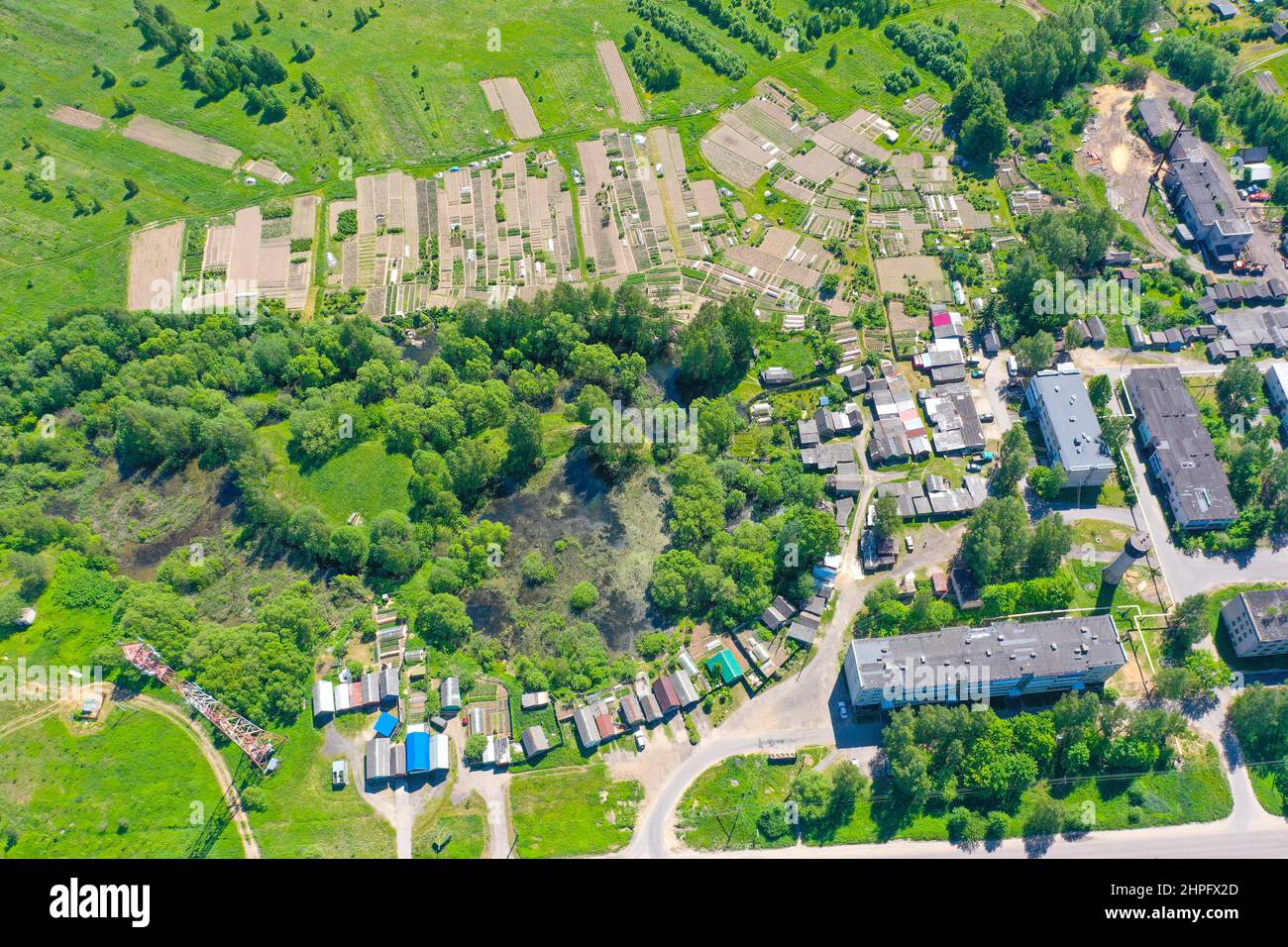 Aerial view of beautiful village in summer countryside. Rundling is a ...