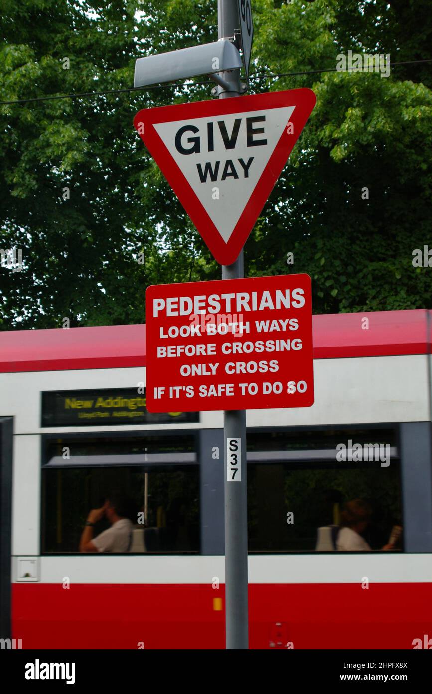 Warning sign at an unattended level crossing. London, UK Stock Photo ...