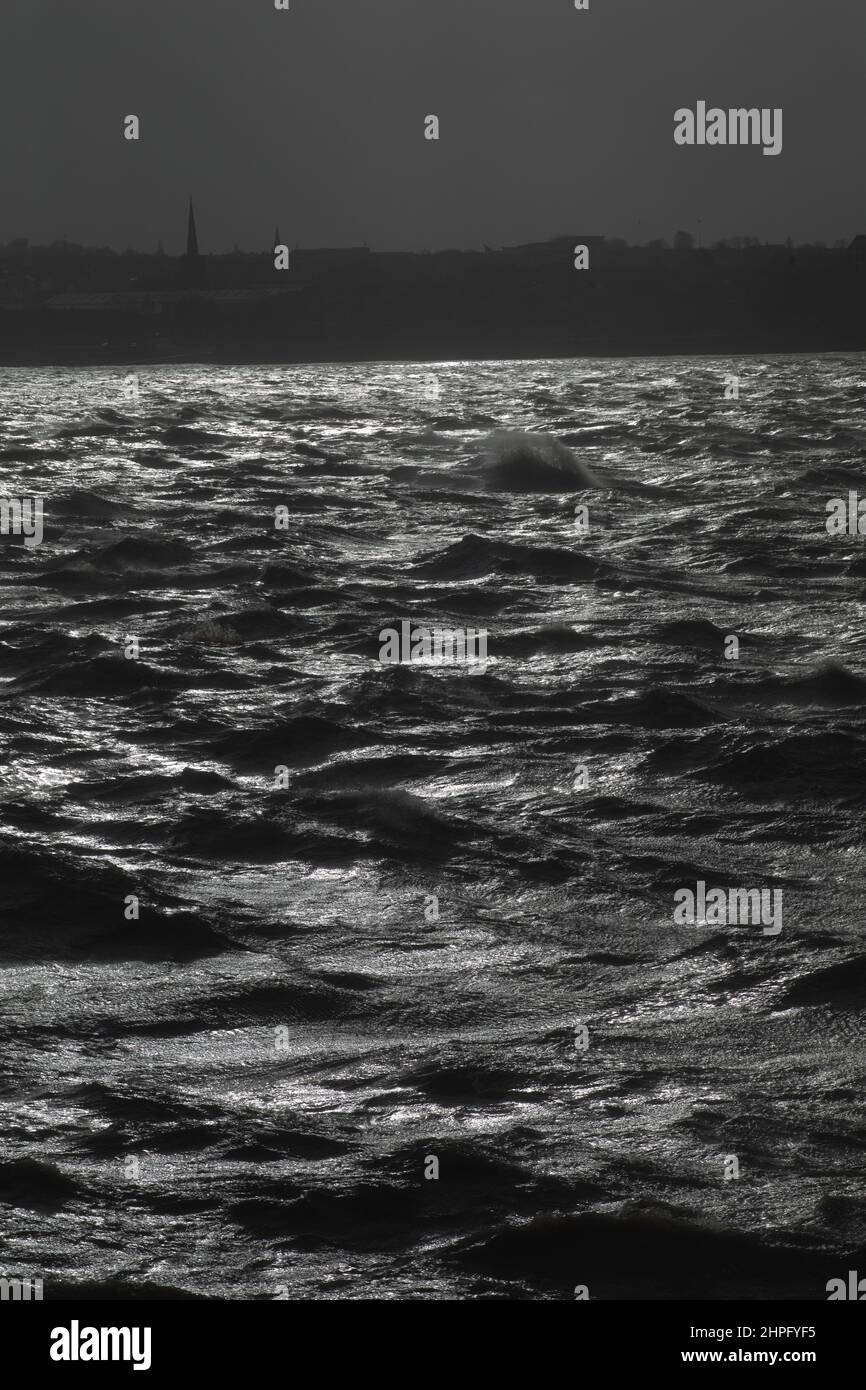 River Mersey at high tide with Storm Eunice whipping up waves ...
