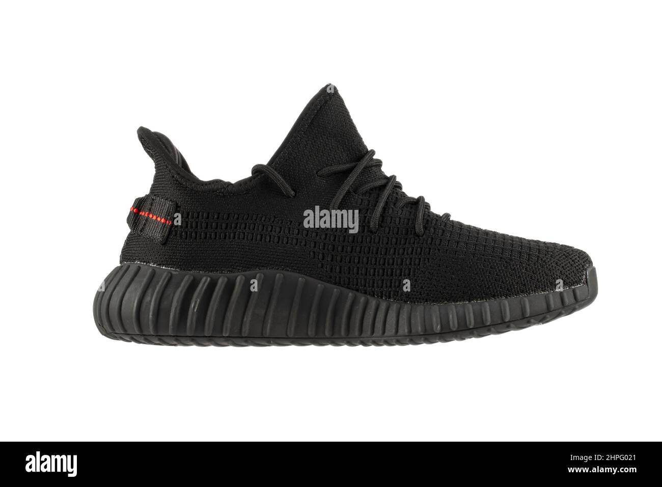 Black rag sneaker on a white background Stock Photo - Alamy