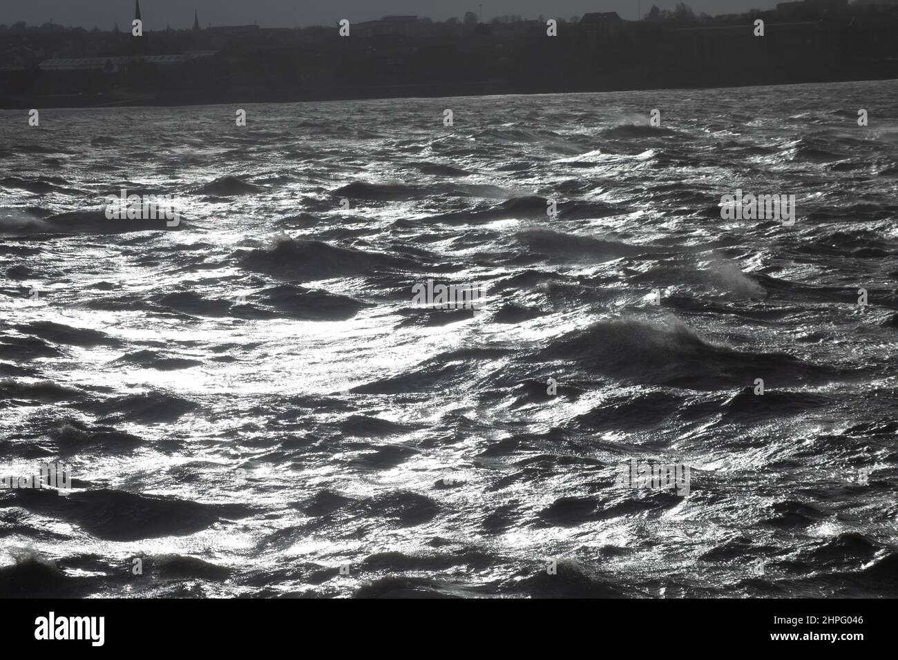 River Mersey at high tide with Storm Eunice whipping up waves ...